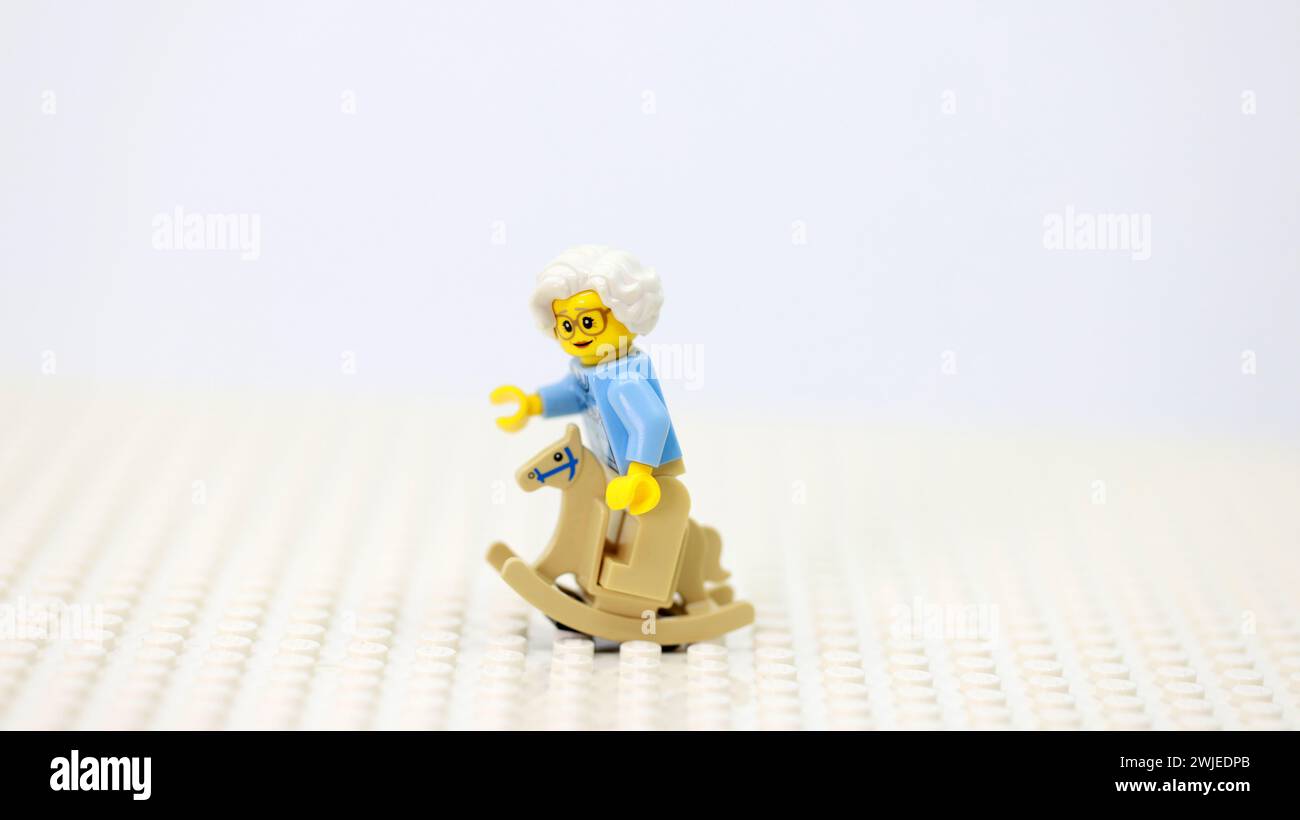 Woman rocking horse hi-res stock photography and images - Alamy