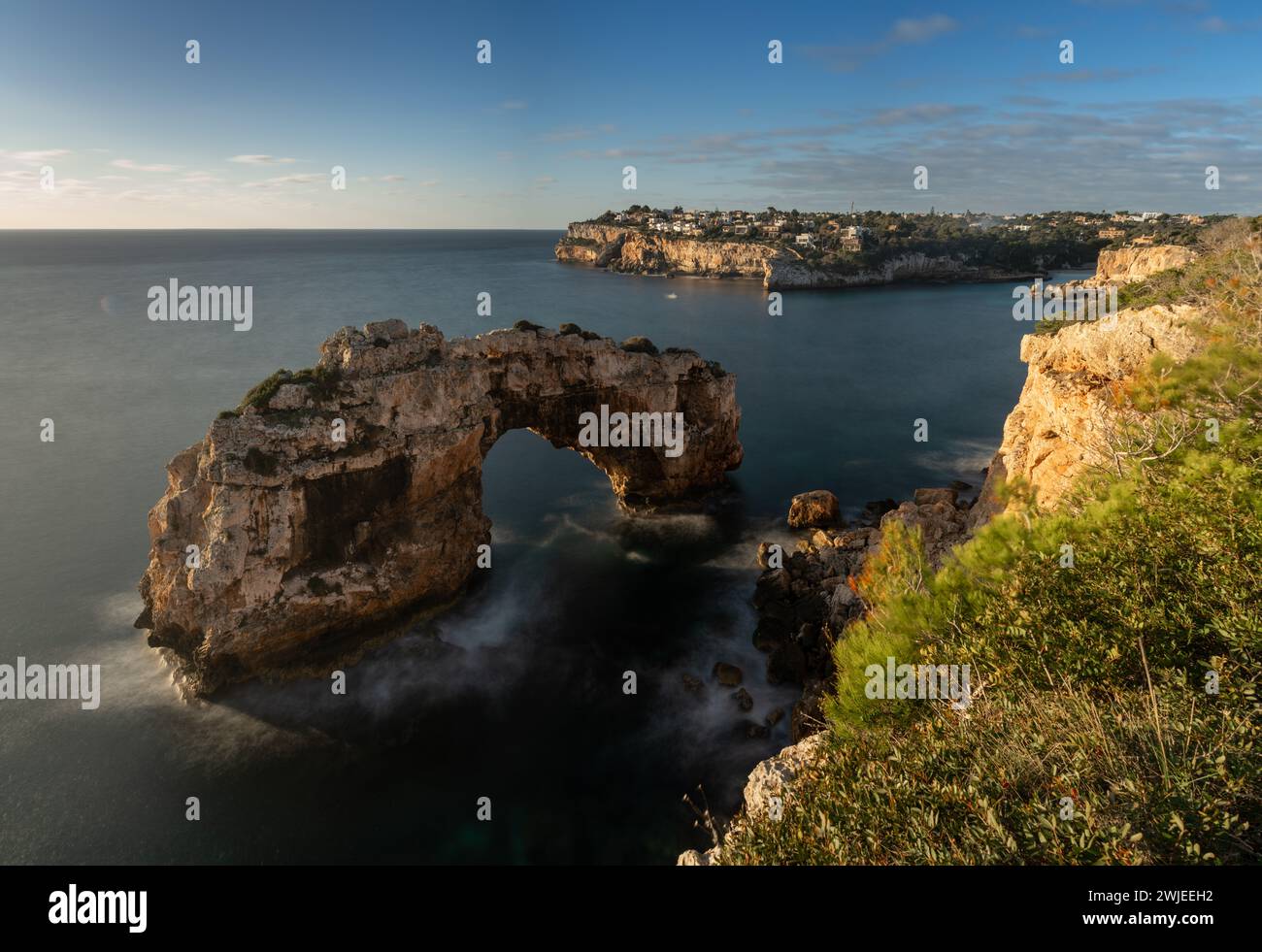 A long exposure view of the natural limestone arch of Es Pontas on ...