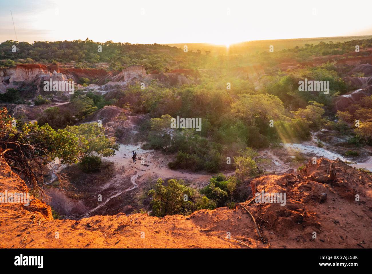 Tourists dwarfed by rock formations at Marafa Depression - Hell's ...