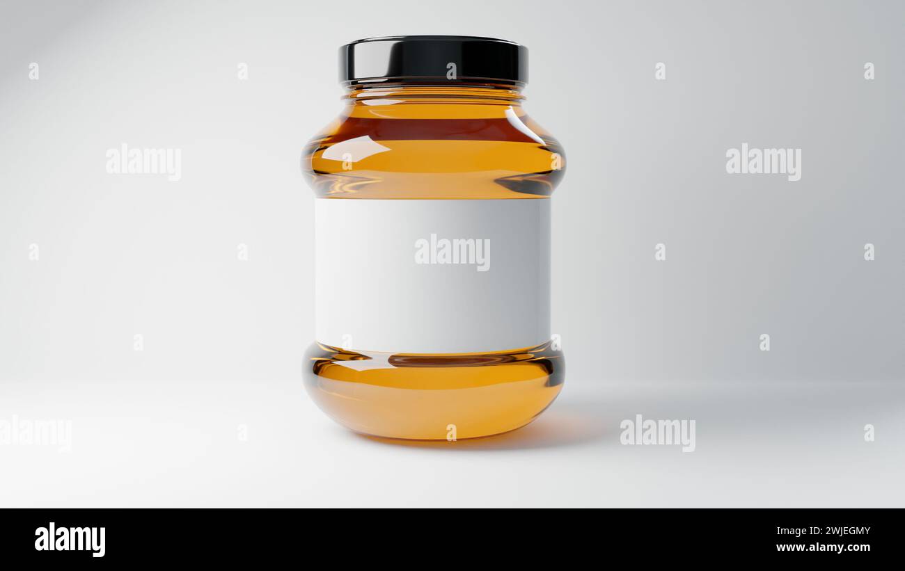 Transparent glass jar with copper metal cap and blank label filled by ...