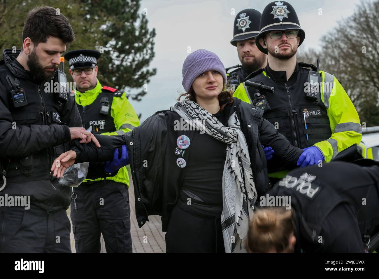After six hours in a three-way-lock-on a protester is arrested outside ...