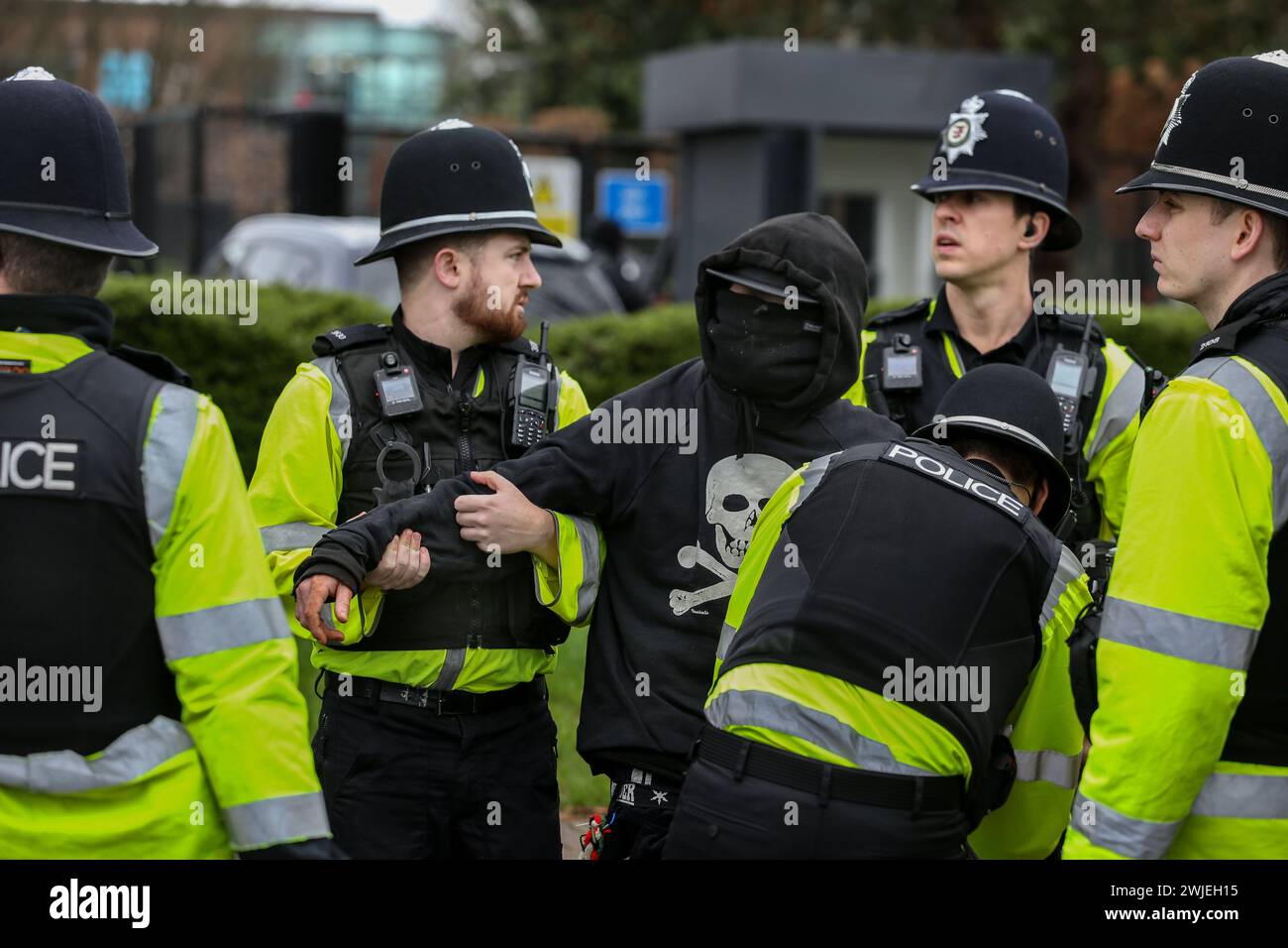 After six hours in a three-way-lock-on a protester is arrested outside ...