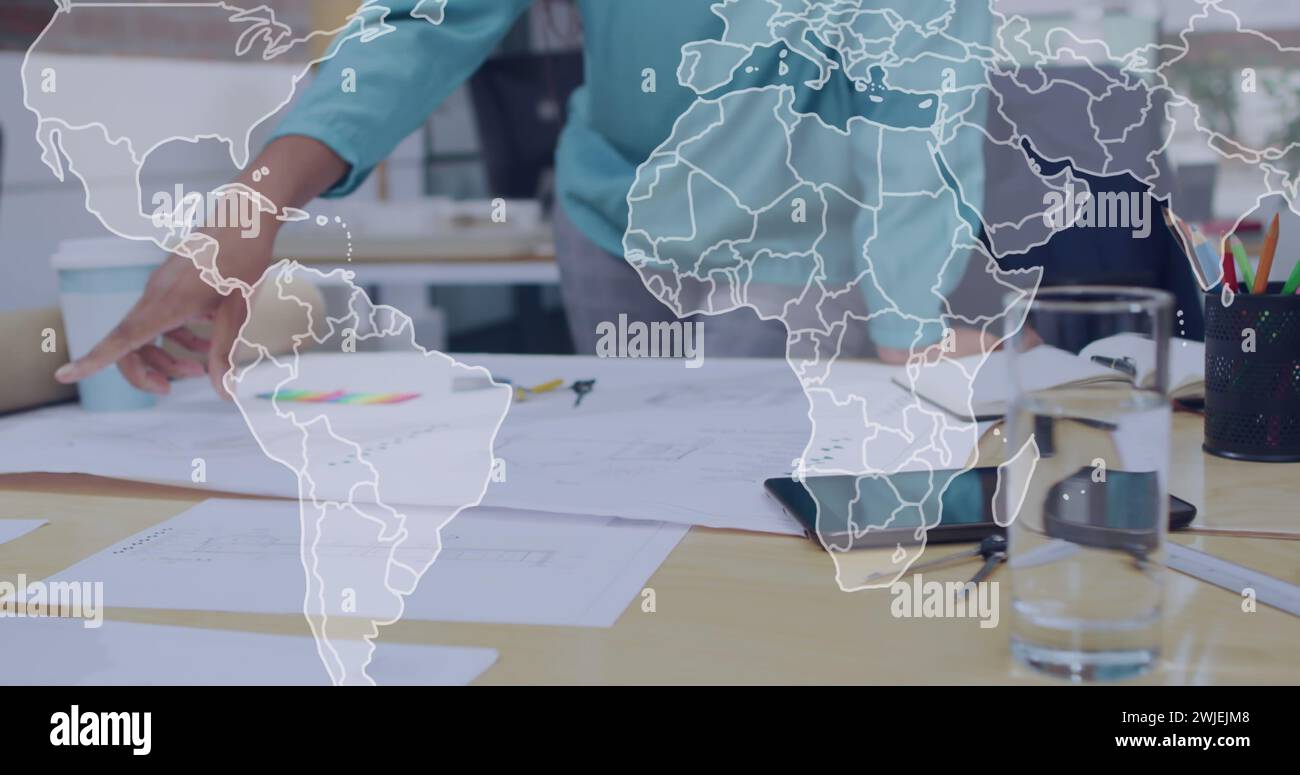 Image of world map over caucasian business people in office Stock Photo ...