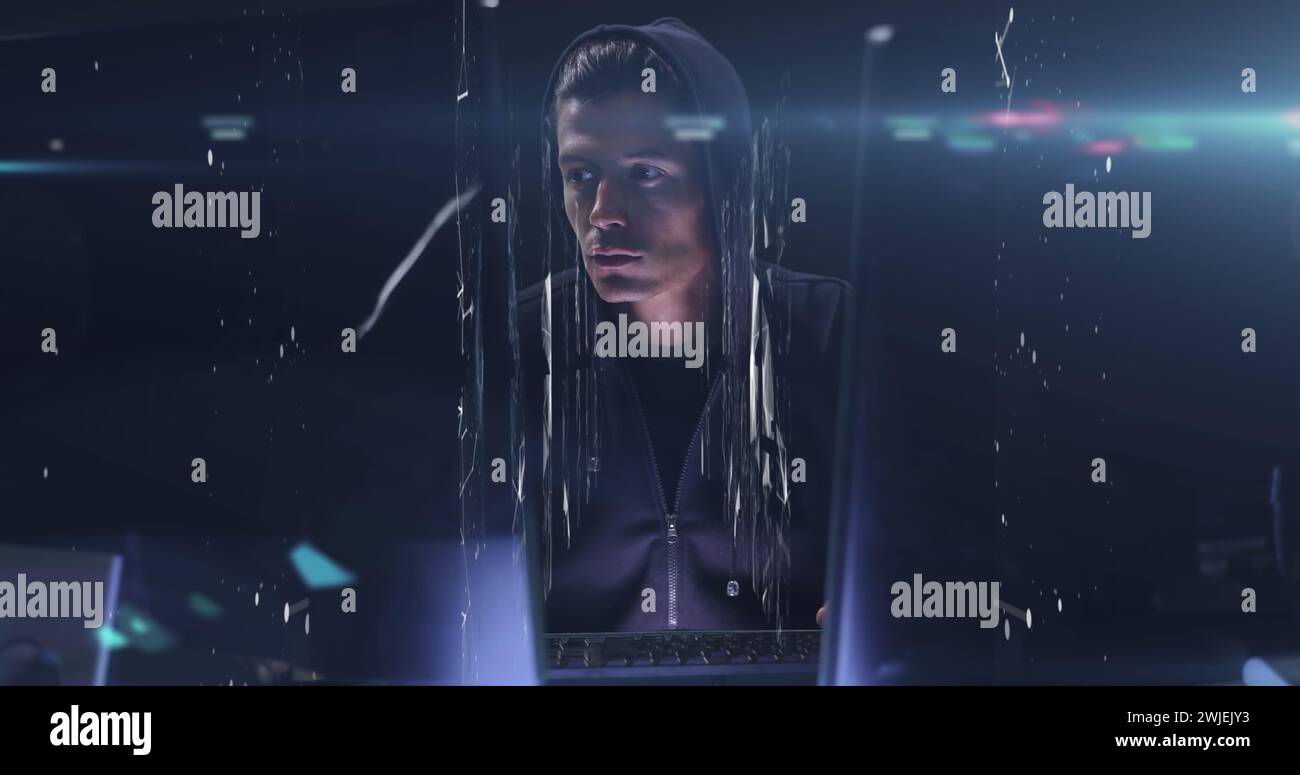 Image of digital interface with data processing and male hacker using computer Stock Photo - Alamy