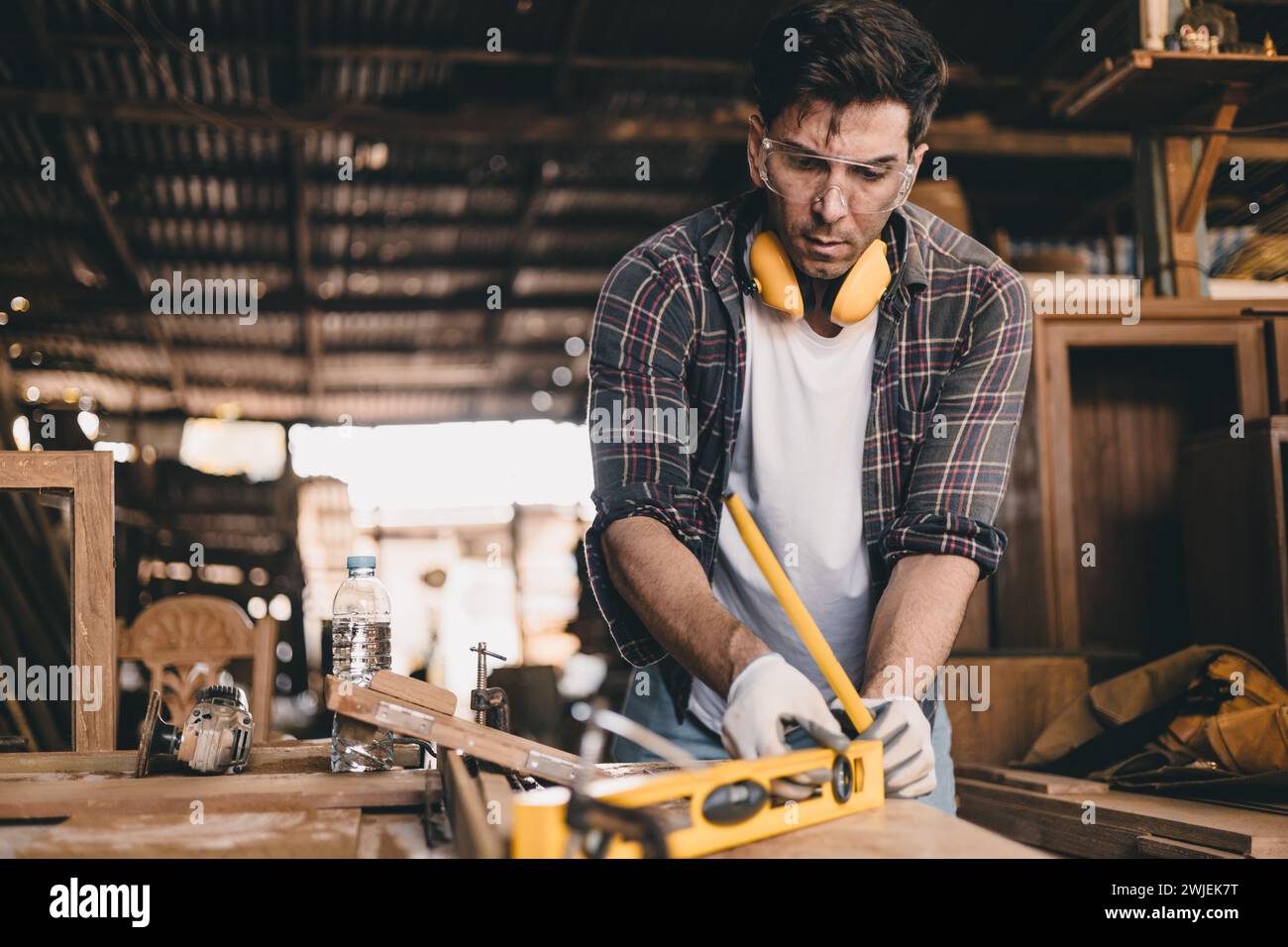 professional carpenter man hand working make wooden handcraft furniture ...