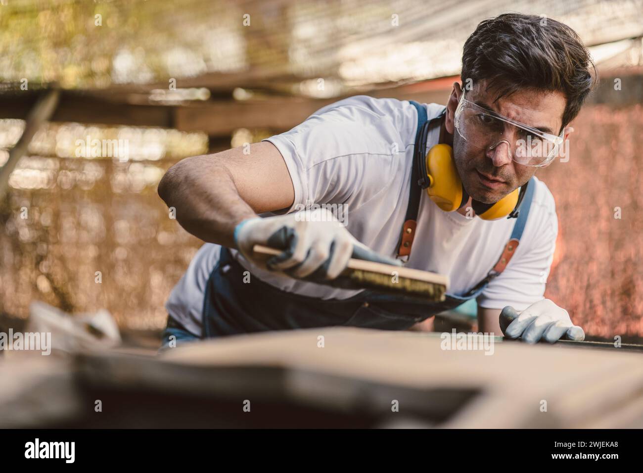 Carpenter man attend to making masterpiece woodworks handcrafted fine ...