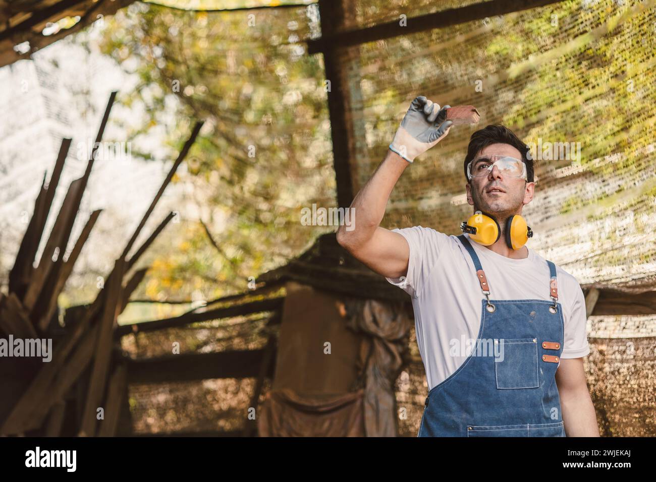 Carpenter man attend to making masterpiece woodworks handcrafted fine ...