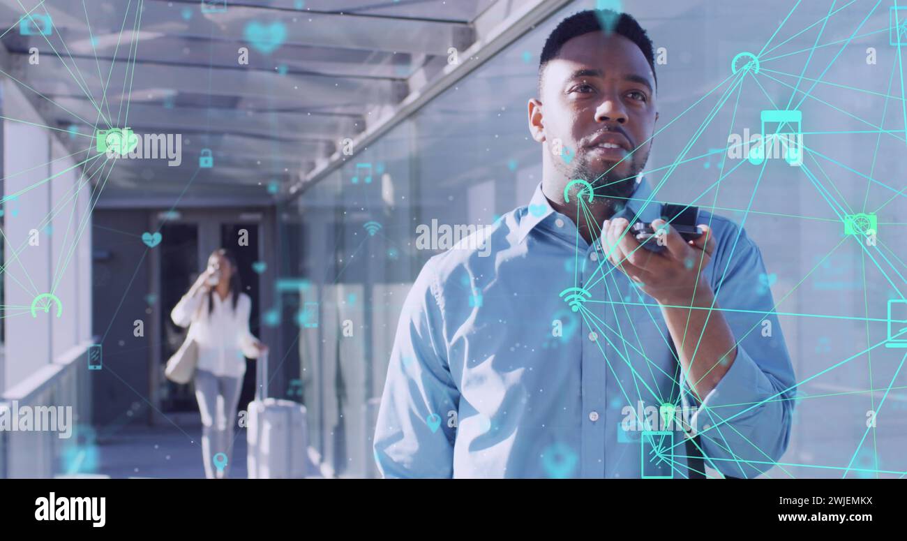 Image of media icons over diverse business people walking Stock Photo ...
