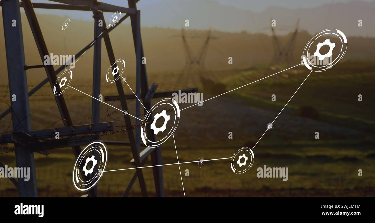 Image of network of conncetions with icons over pylons Stock Photo - Alamy