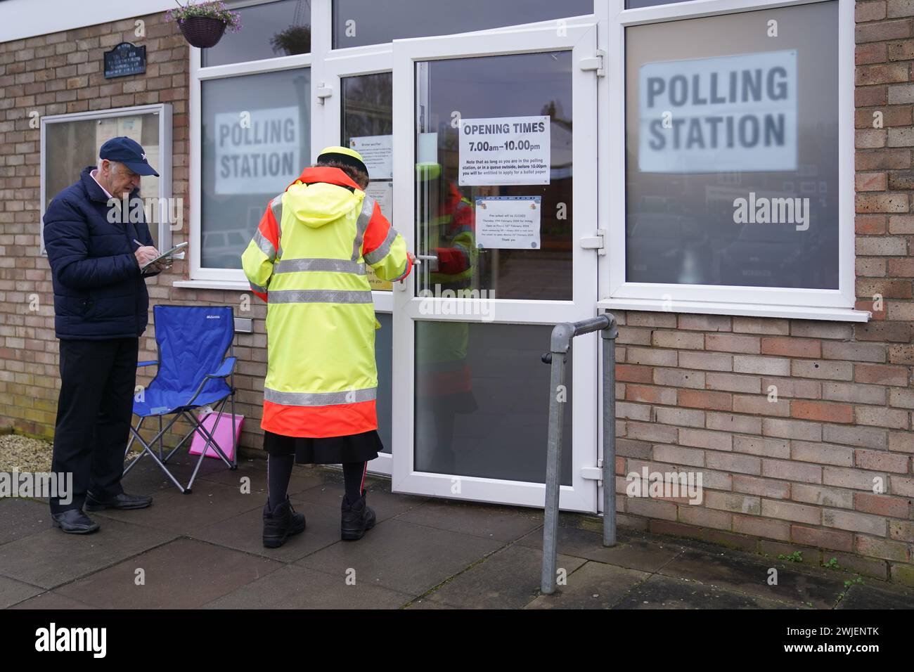 People arrive at Irchester Village Hall, as voting gets underway in the ...