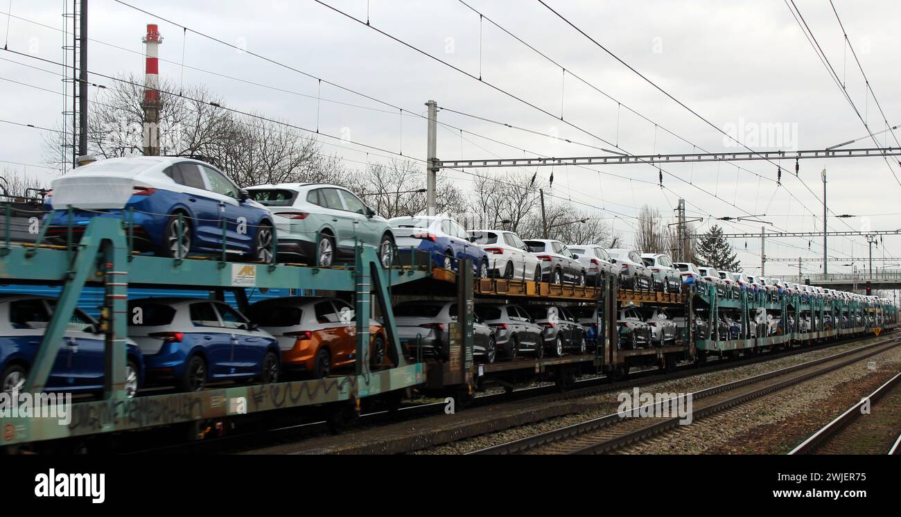 Double deck car carrier wagons with new Skoda cars passes through Lysa ...