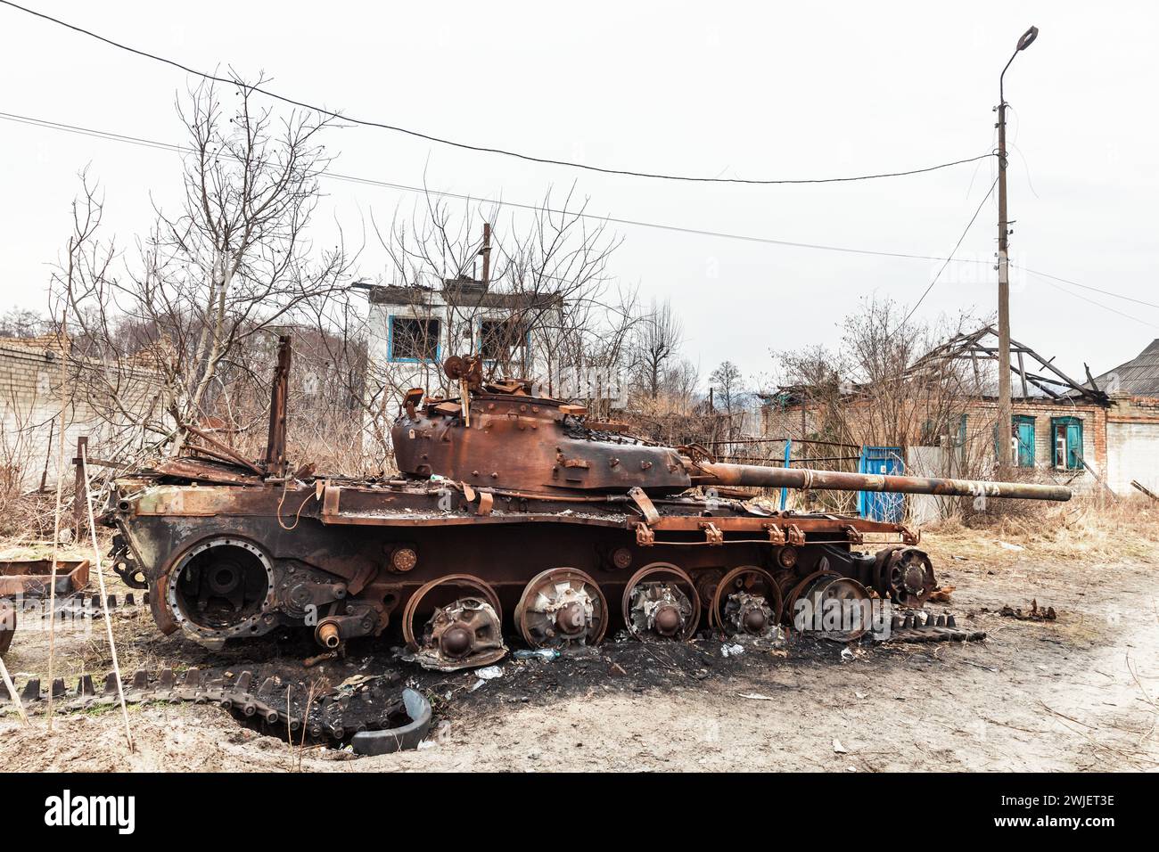 A burnt-out Russian tank on the street of Svyatogirsk, Donetsk region ...