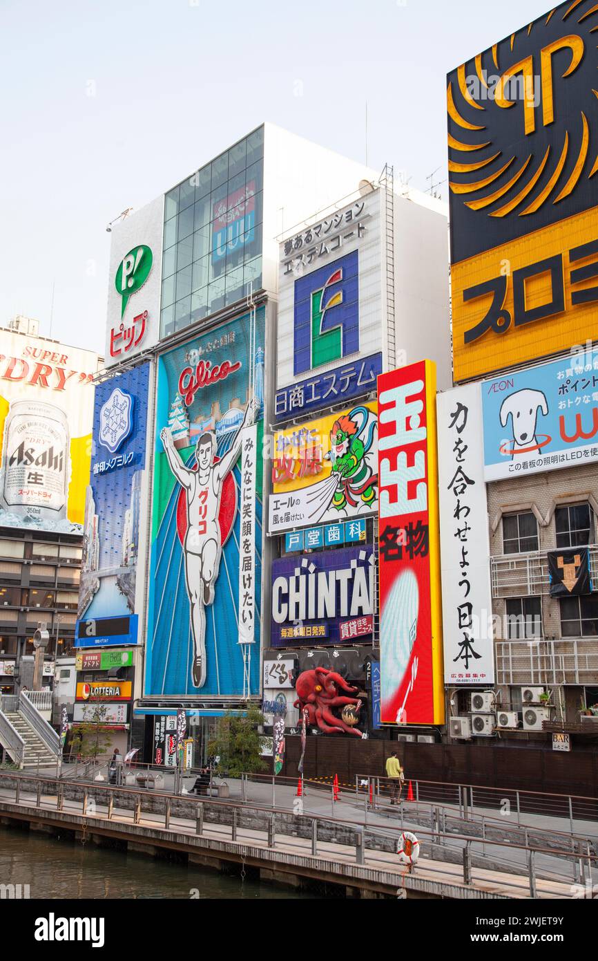 Dotonbori Canal in downtown Osaka, Japan with lots of restaurants, billboards and people Stock ...