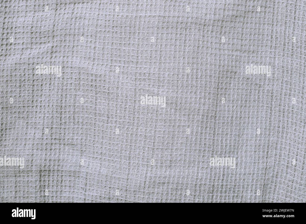 Wrinkled waffle linen textile texture Stock Photo - Alamy