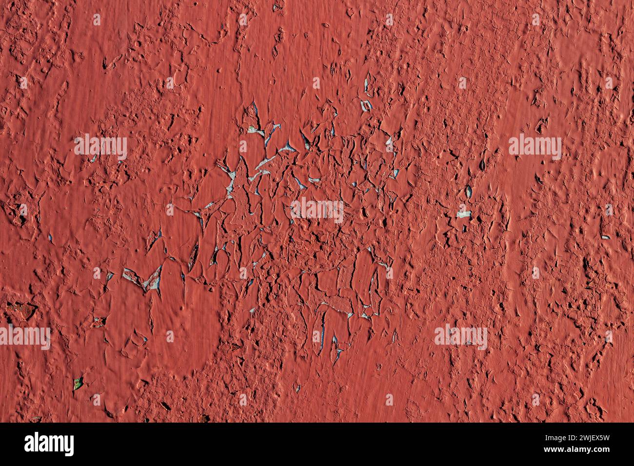 Red peeling paint on a metal surface. Texture Stock Photo - Alamy