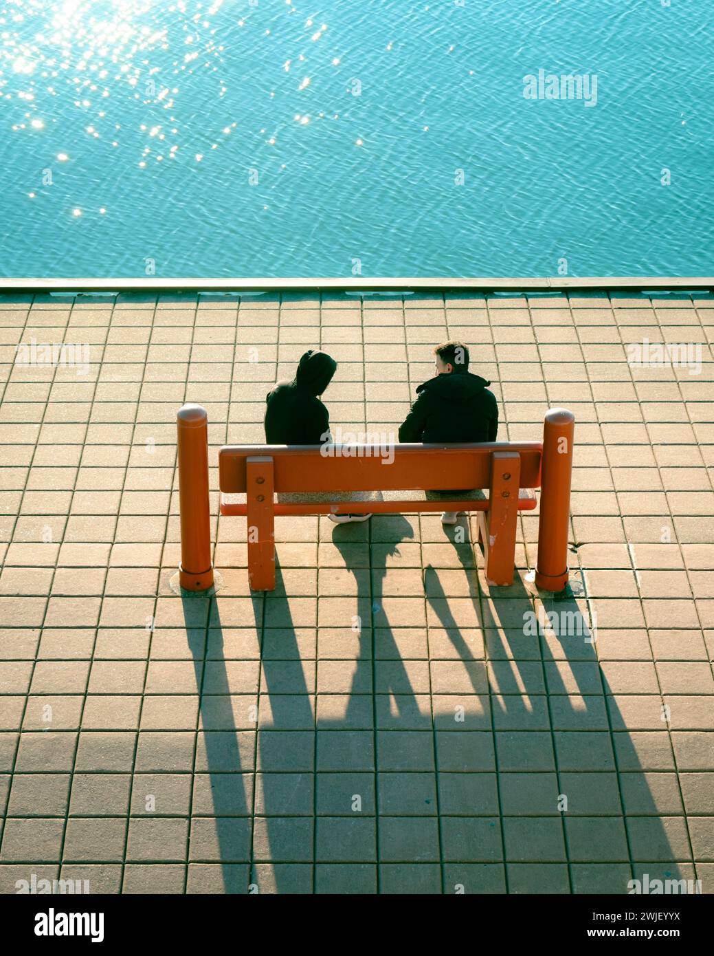 People sitting on a bench along Lake Erie, in Erie, Pennsylvania Stock ...