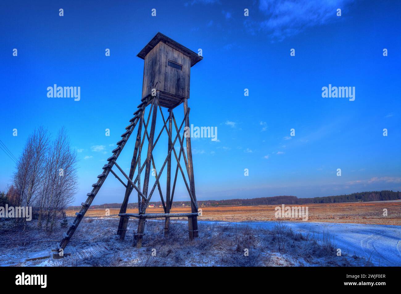 Landscape with hunting lodge in middle of meadow Stock Photo - Alamy