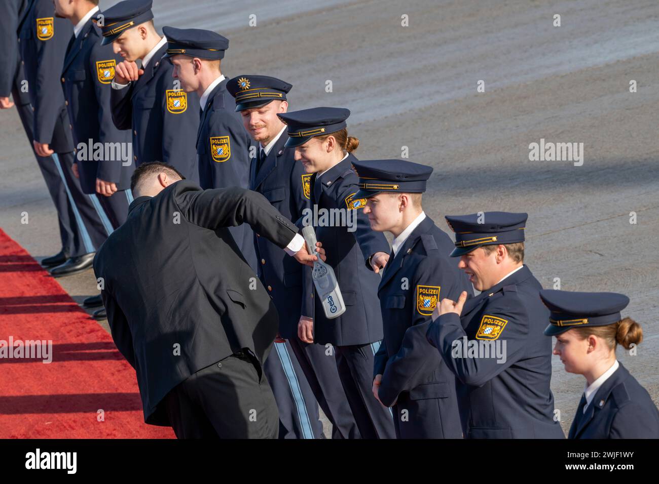 15 February 2024, Bavaria, Munich: A US security officer checks ...