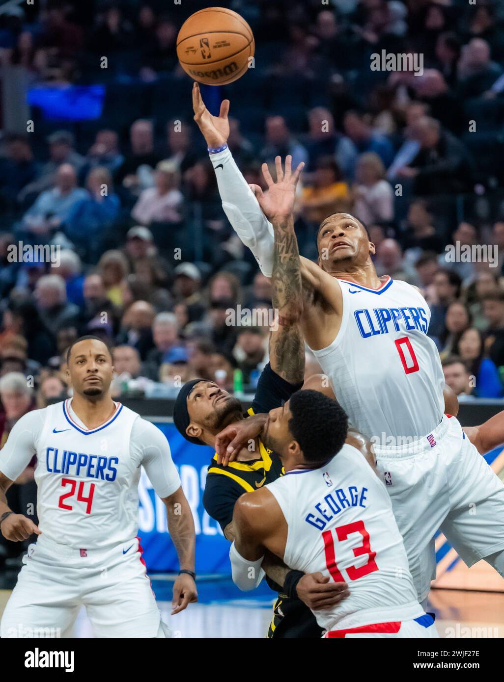 San Francisco, USA. 14th Feb, 2024. Russell Westbrook (top) of Los ...
