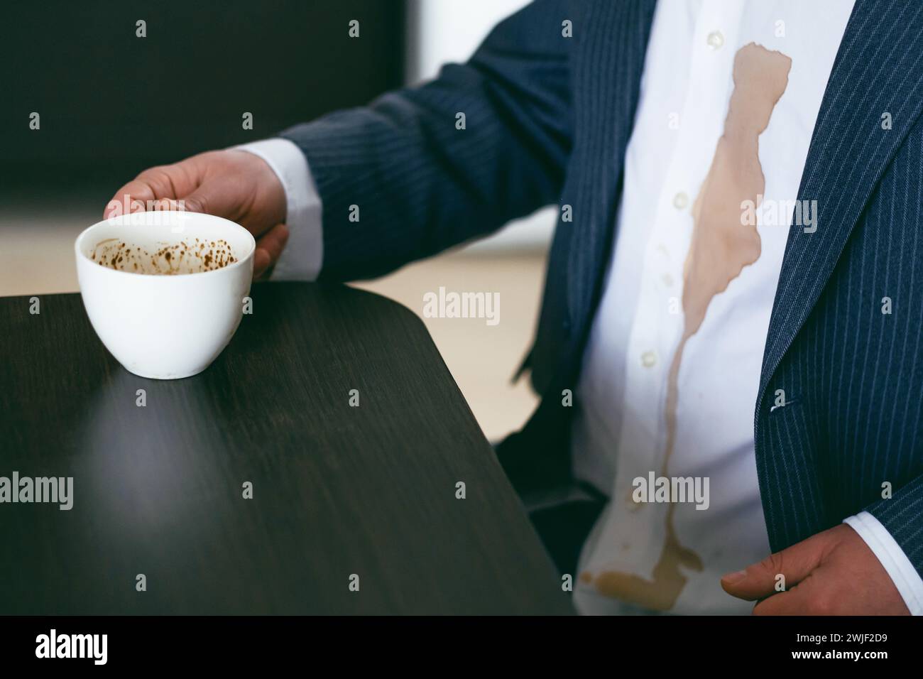 Business suit wet hi-res stock photography and images - Alamy