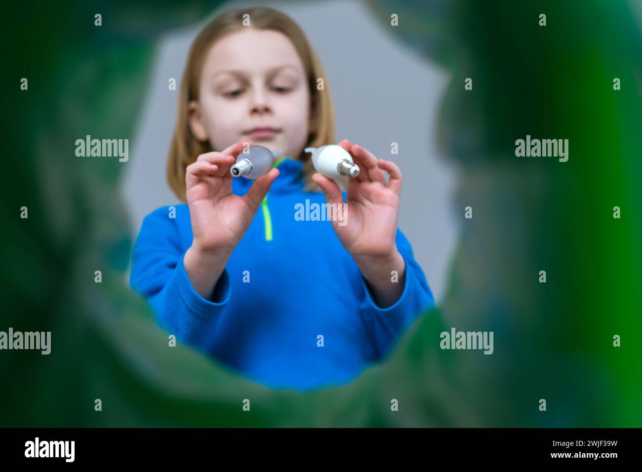 Low angle view hands male sorting plastic bottles in recycle bin in ...