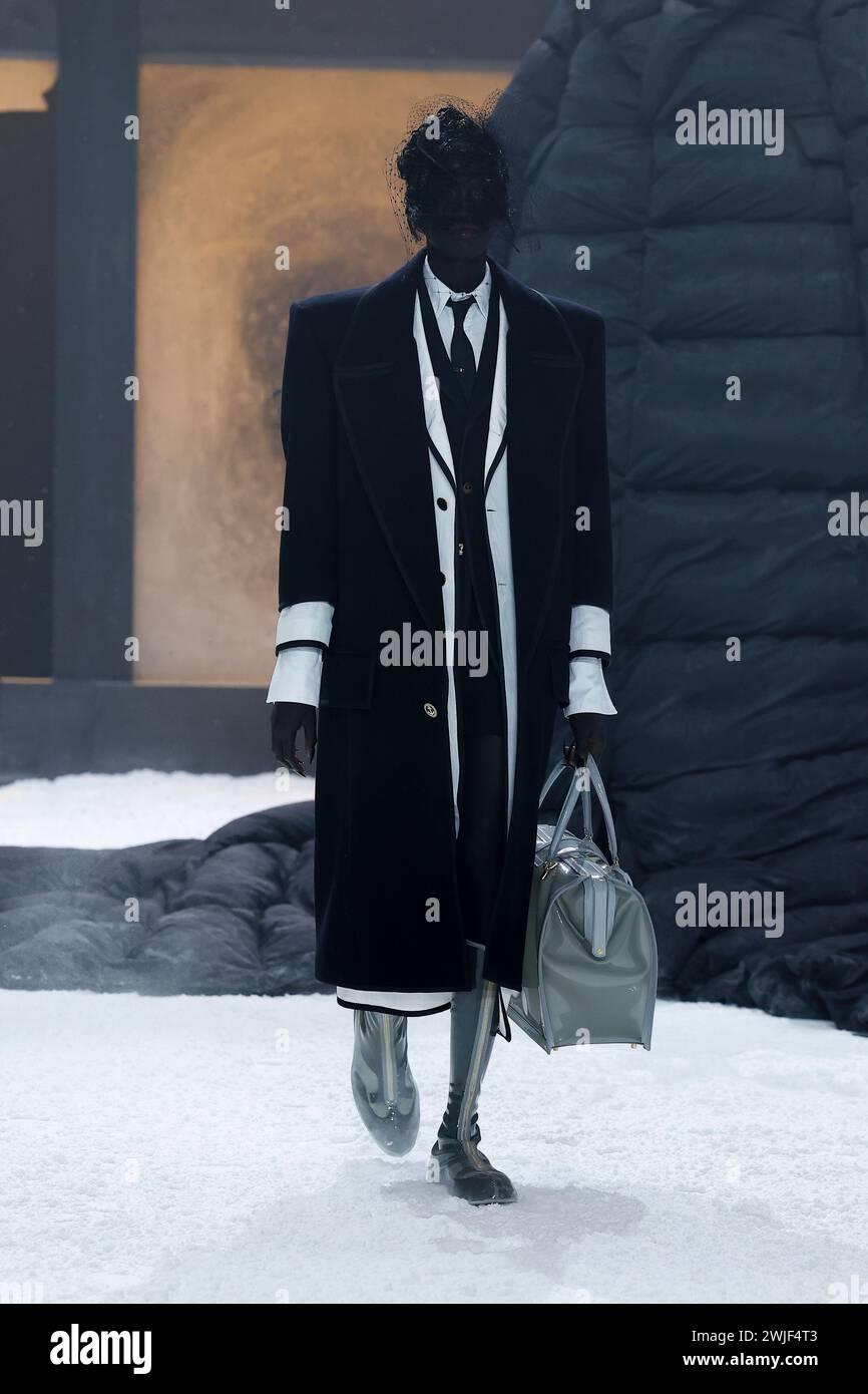 New York, USA. 14th Feb, 2024. Model Mamuor Majeng walks on the runway ...