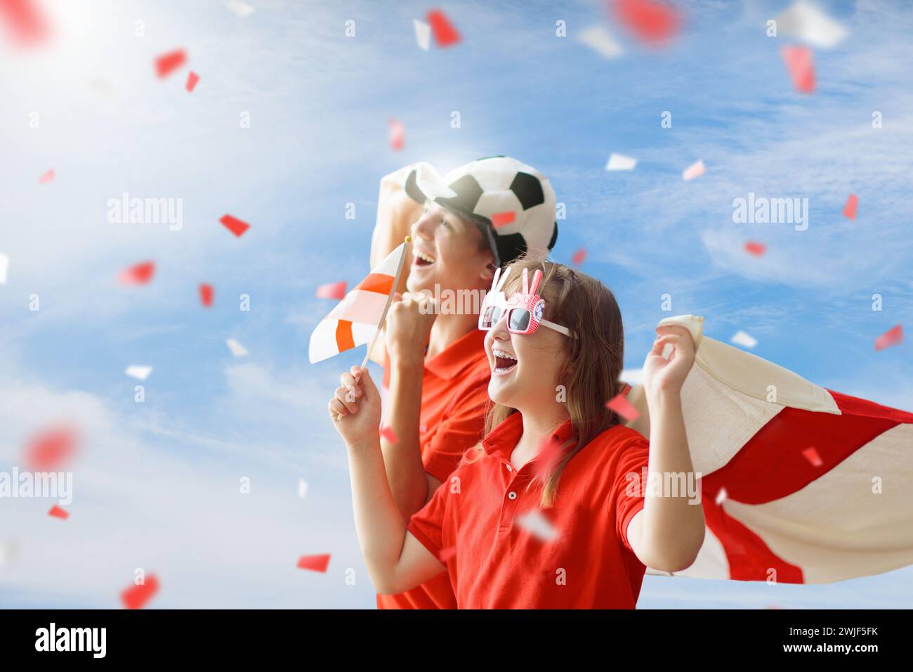 England football supporter on stadium. English fans on soccer pitch ...