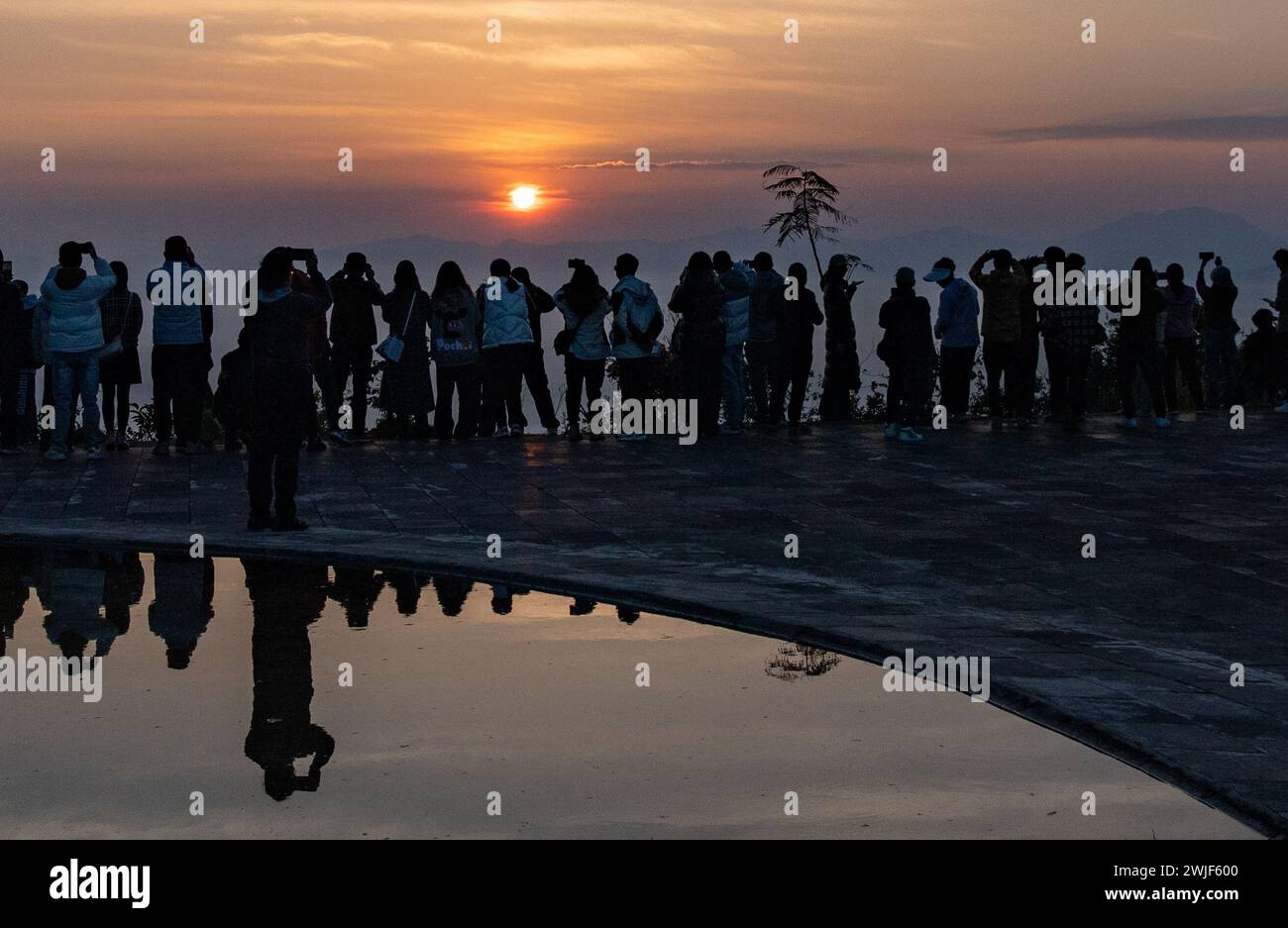 Beijing, China's Yunnan Province. 14th Feb, 2024. Tourists watch ...