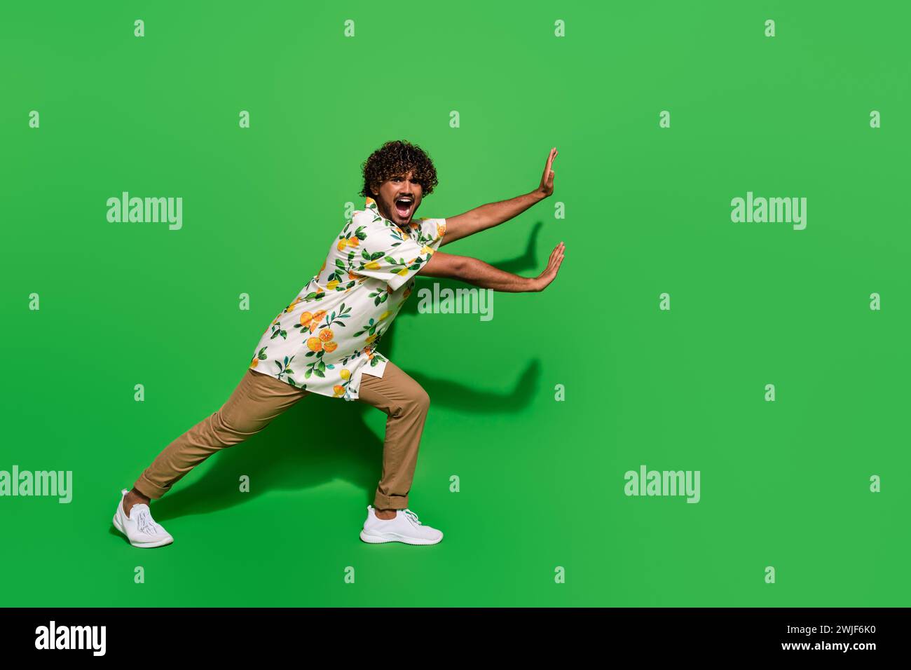 Full body photo of attractive young man push empty space promo wear ...