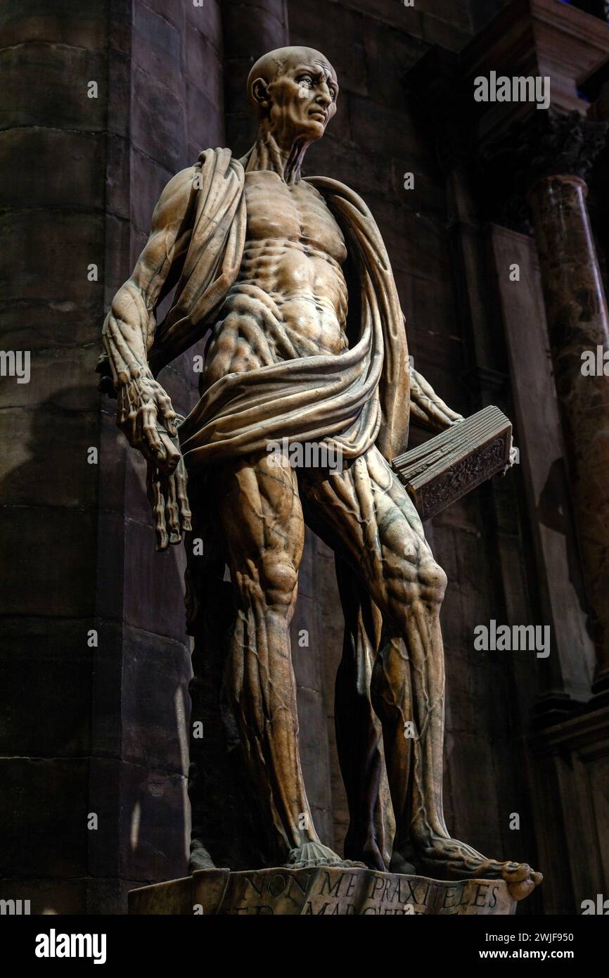 Saint Bartholomew sculpture in the cathedral of Duomo, in Milan, Italy ...