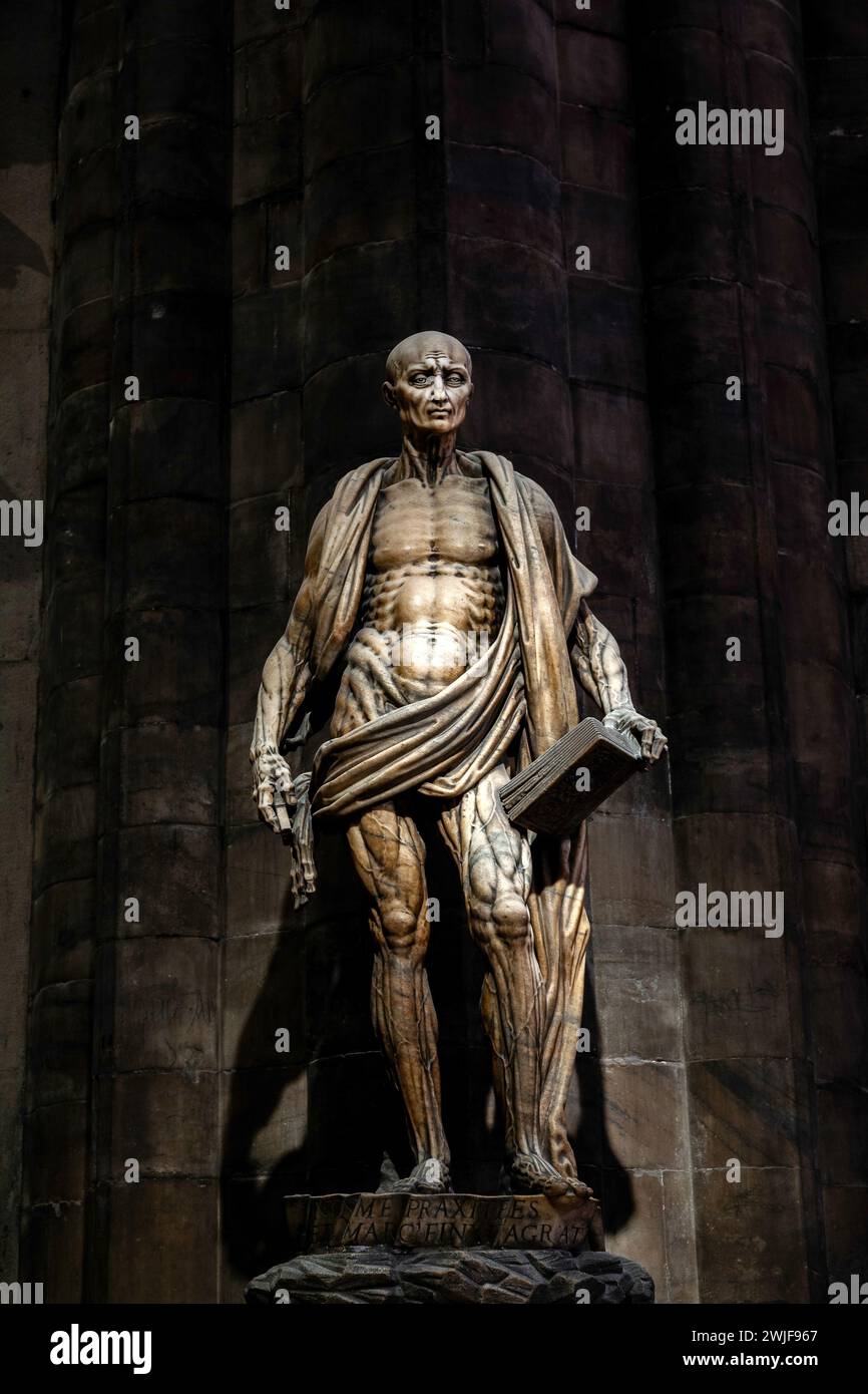 Saint Bartholomew sculpture in the cathedral of Duomo, in Milan, Italy ...
