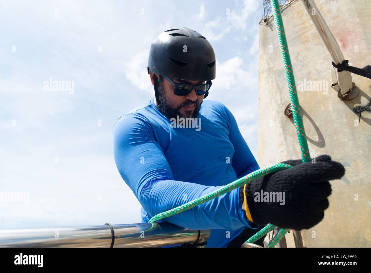 Salvador, bahia, Brazil - January 07, 2024: Rappeller carefully ...