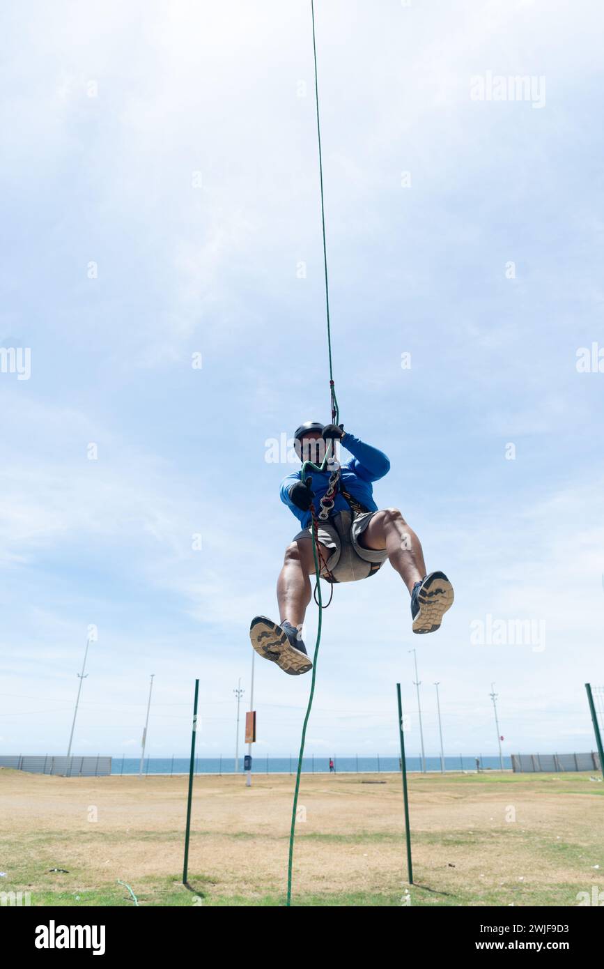 Salvador, bahia, Brazil - January 07, 2024: Rappelist hanging from the ...
