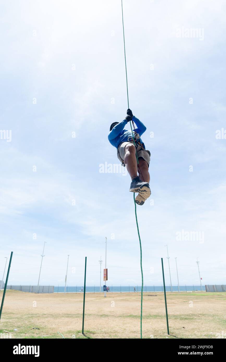 Salvador, bahia, Brazil - January 07, 2024: Rappelist hanging from the ...