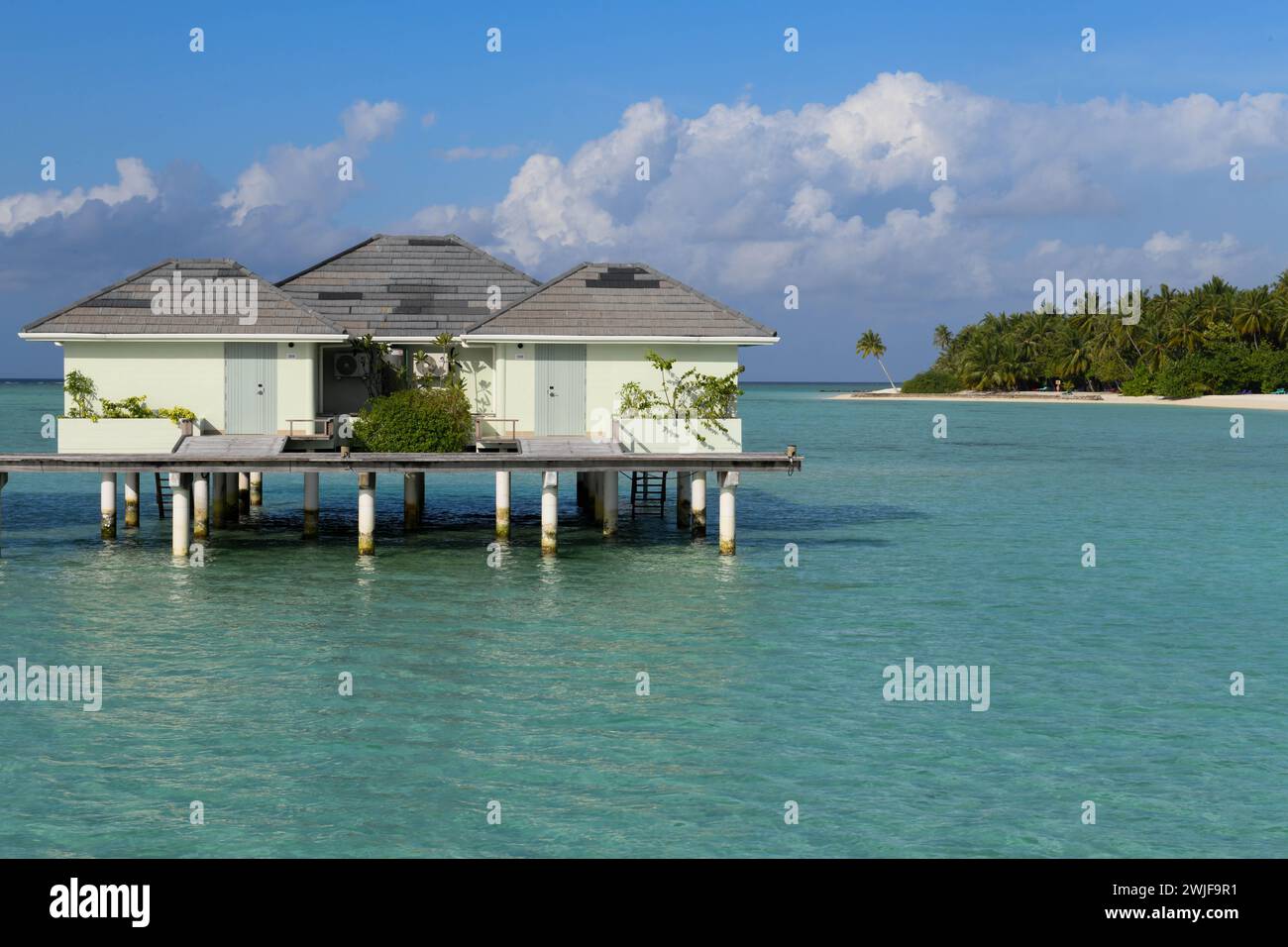 View at the water villas of Villa Park resort on Ari atoll in Maldives ...
