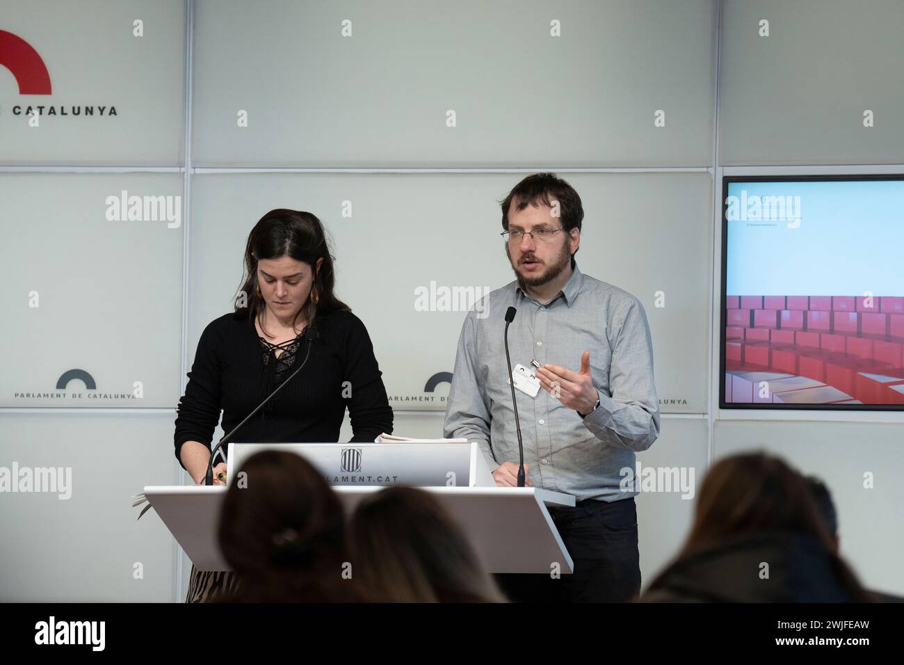 Israeli military technology expert Shir Hever (r) holds a press ...