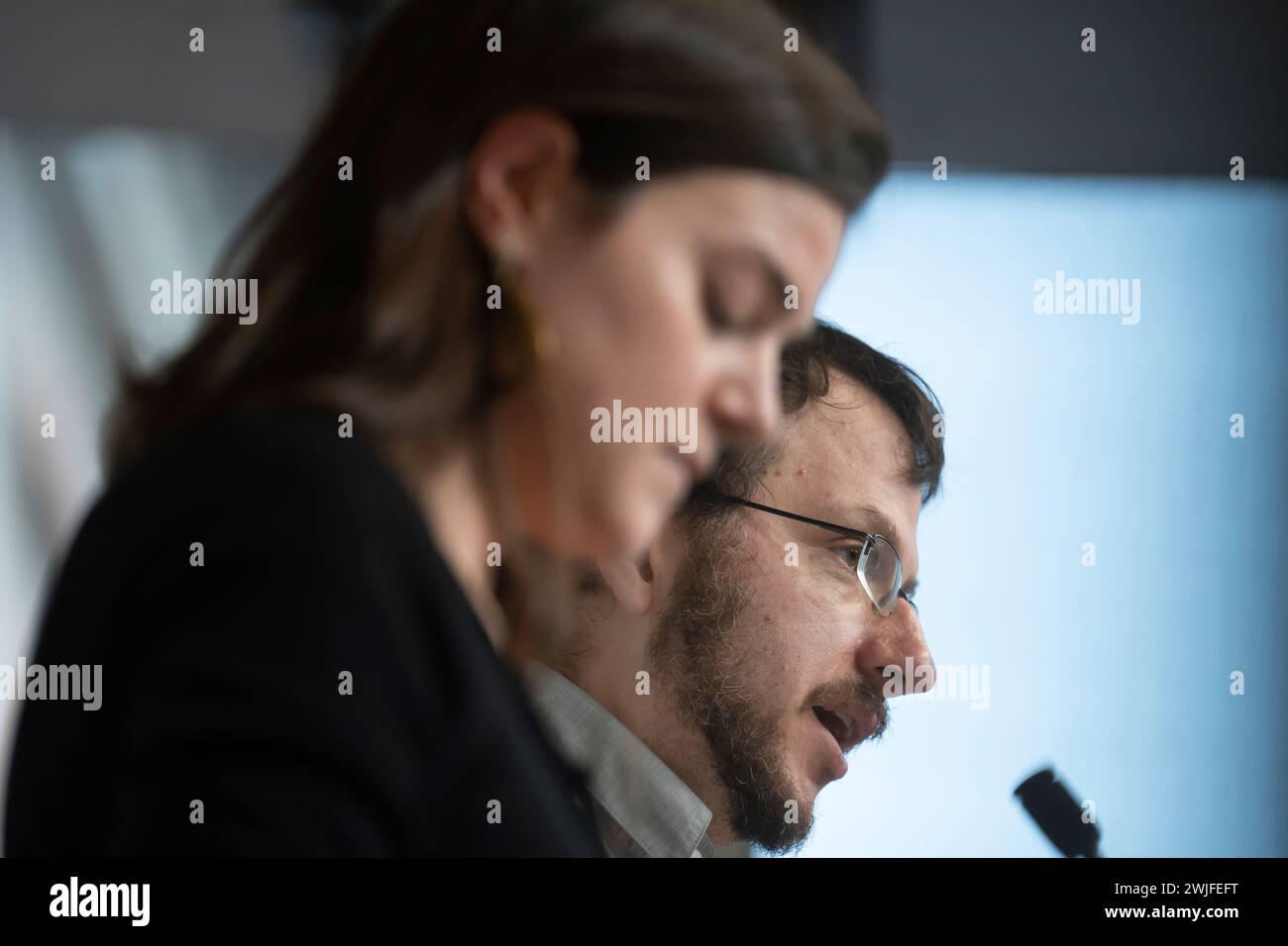 Israeli military technology expert Shir Hever (r) holds a press ...