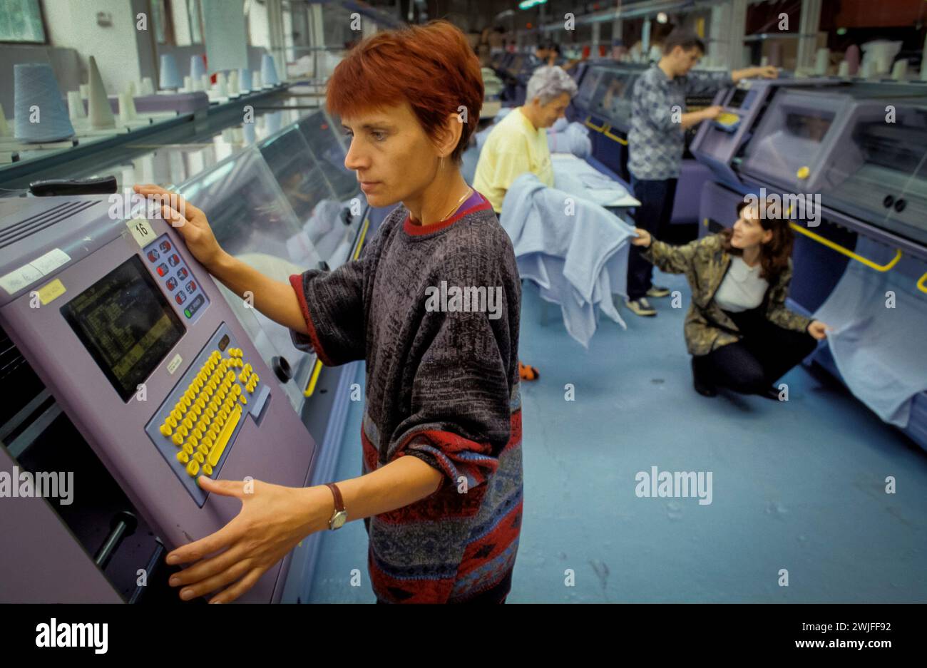 Romania, Sat-mare , female employees at weaving machines Stock Photo ...