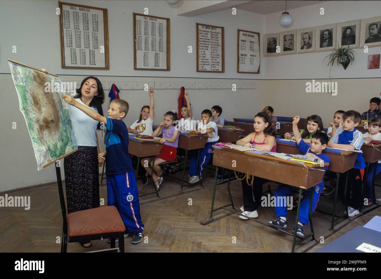 Romania, Bucharest, primary school class during a geography lesson ...