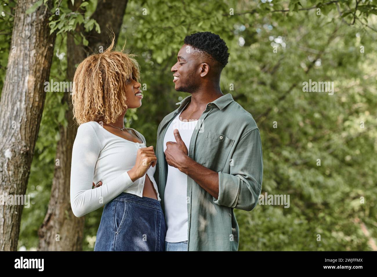 sign language, happy african american couple communicating with ...