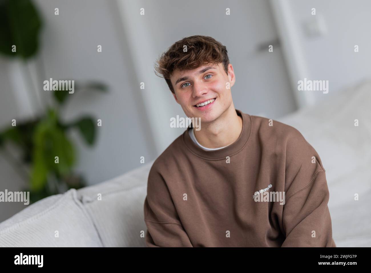 Cologne, Germany. 15th Feb, 2024. Trans man Jamie Williams sits in his ...