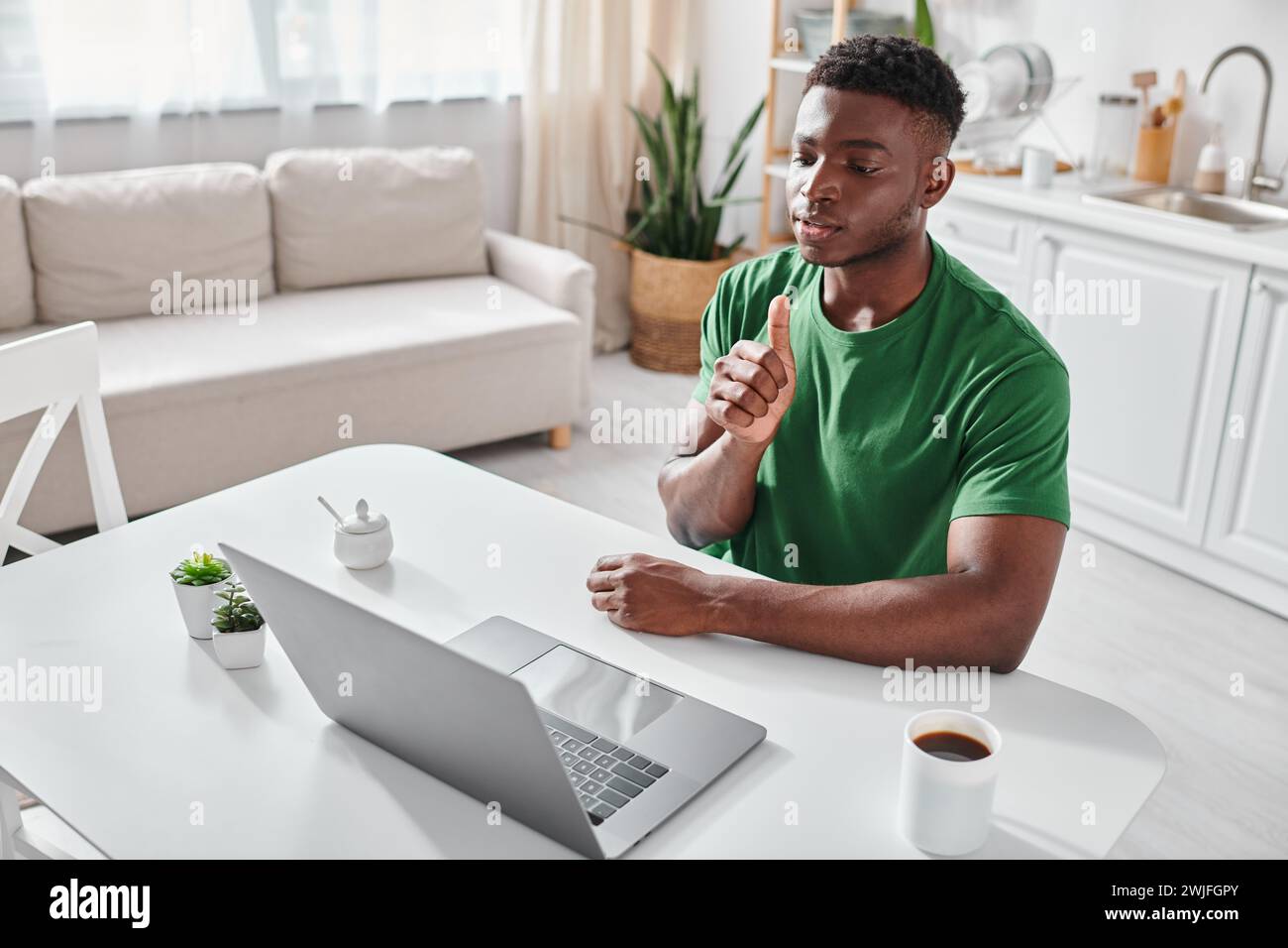 deaf african american man using sign language for online communication ...