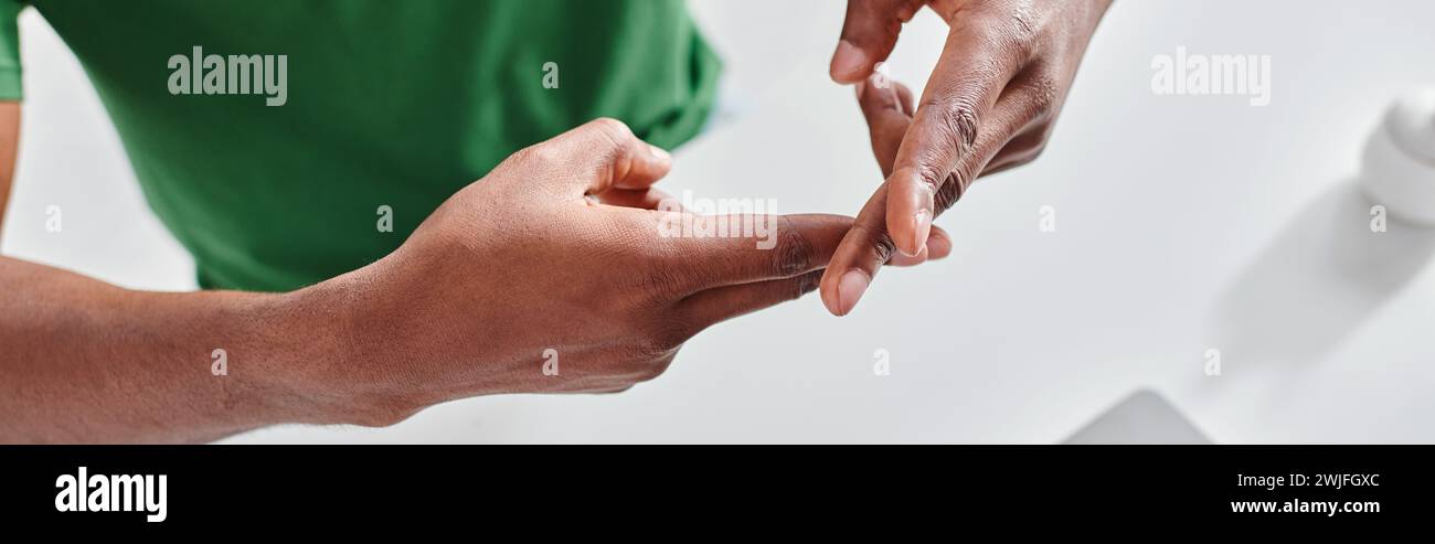 cropped african american man using sign language for nonverbal ...