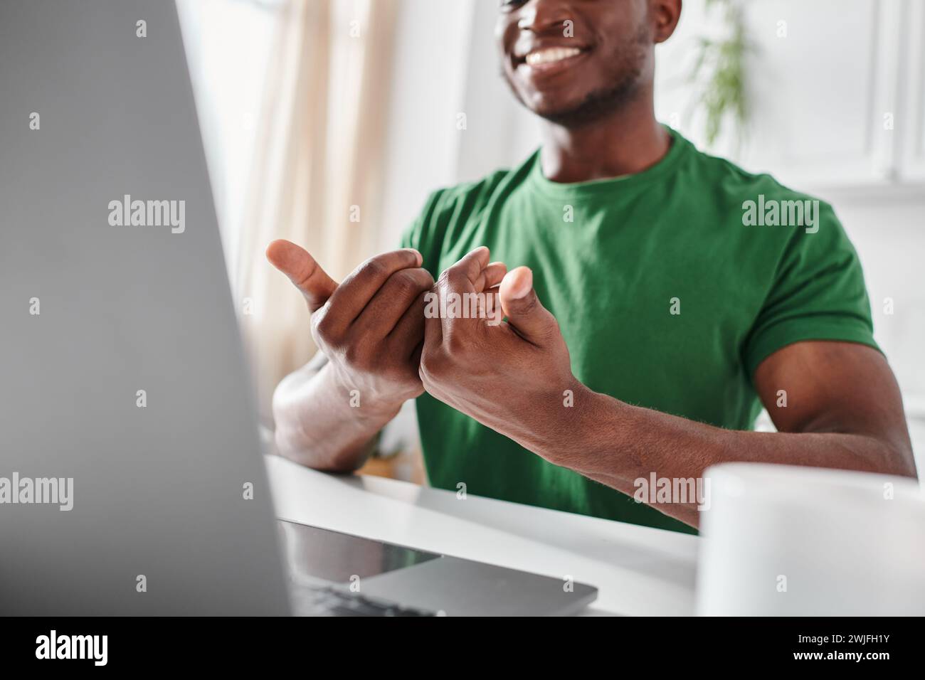 cropped happy deaf african american man using sign language for ...