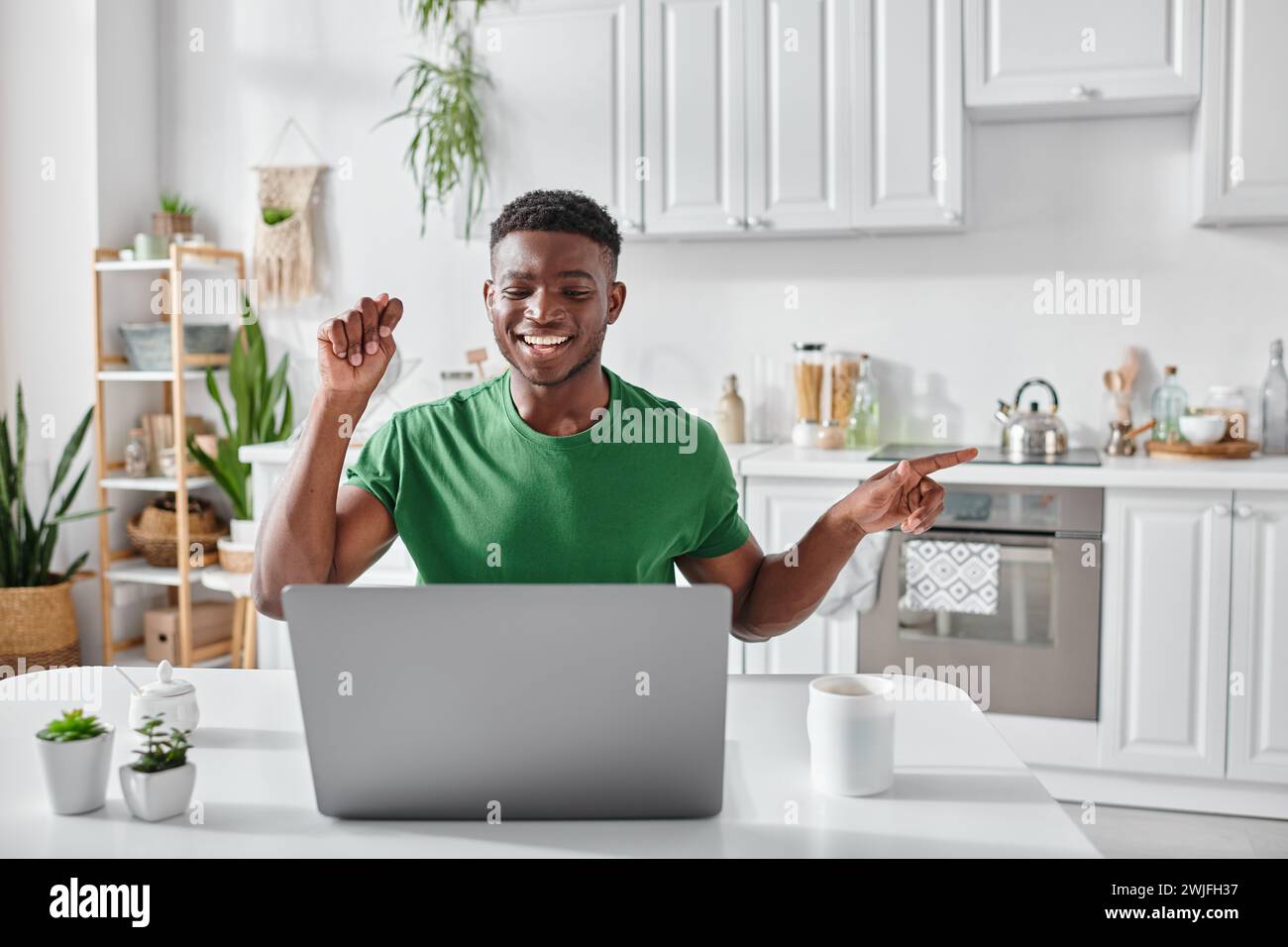 positive deaf african american freelancer using sign language during ...