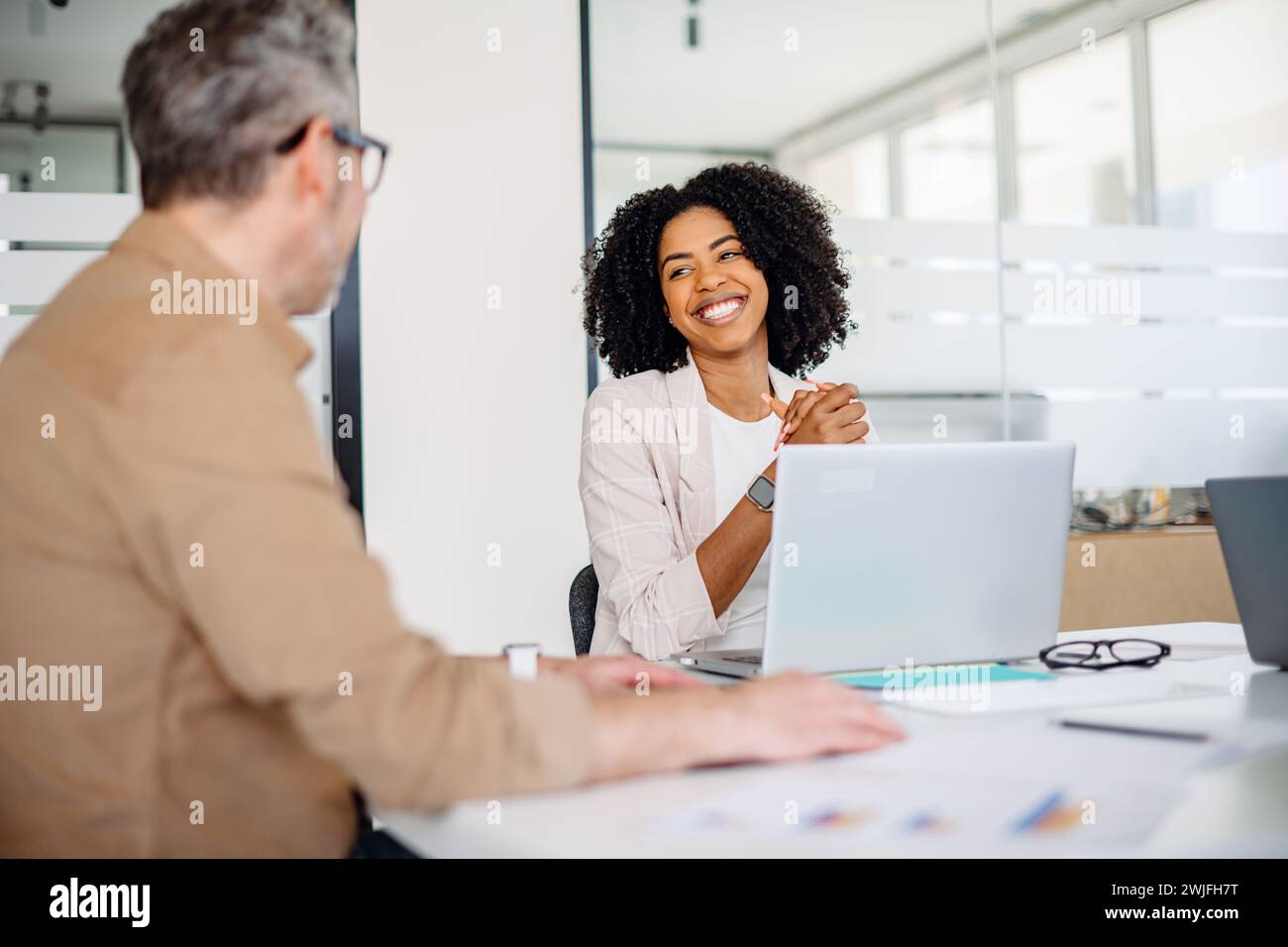 A professional meeting captures the essence of teamwork, with a ...