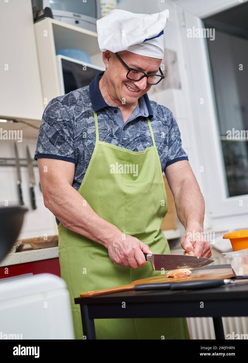 Removing skin chicken hi-res stock photography and images - Alamy