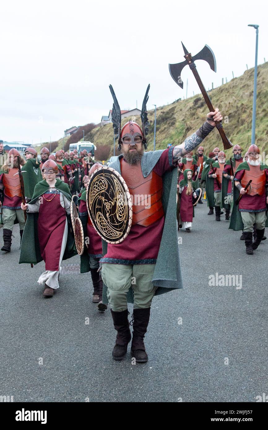 2024 Guizer Jarl John Robert leads his squad through Shetland town ...