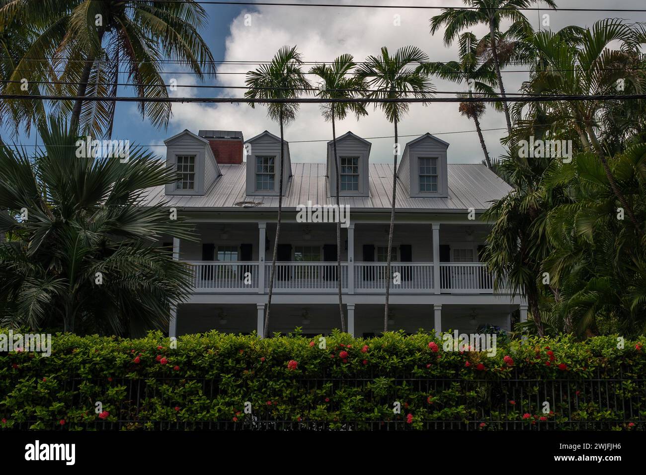 Typical wooden built, colonial style building, with a wrap around ...