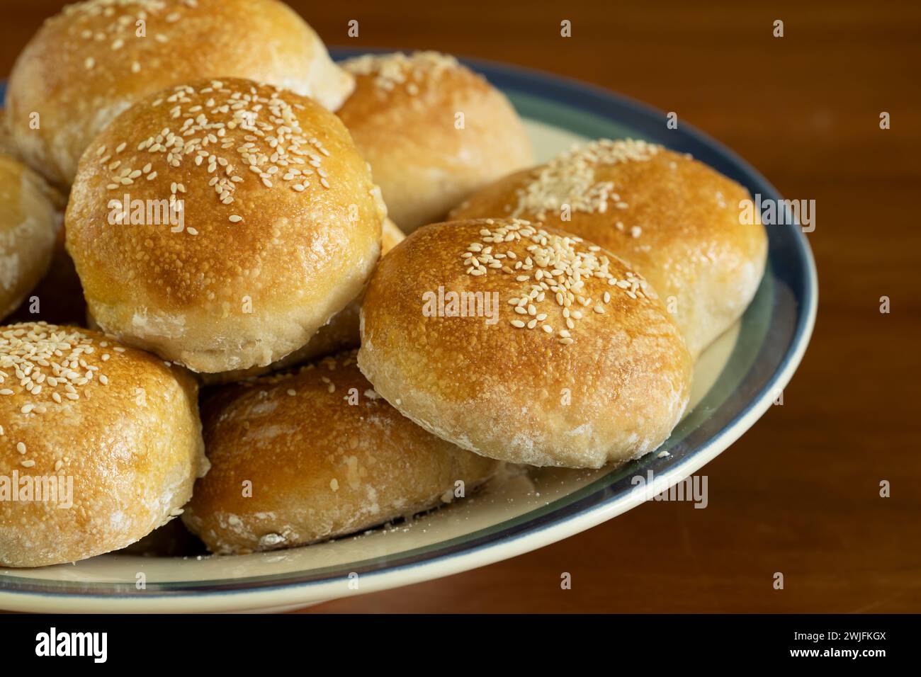 Fresh baked buns right out of oven to table Stock Photo - Alamy